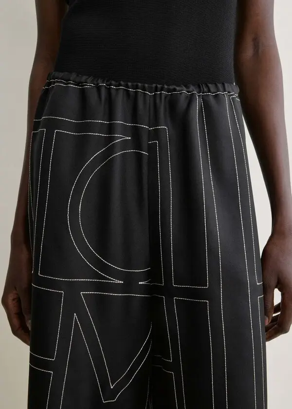 TOTEME Monogram Embroidered Relaxed Shorts - Black