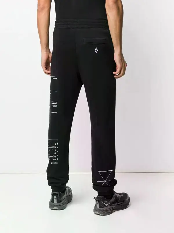 COUNTY OF MILAN Printed Track Pants