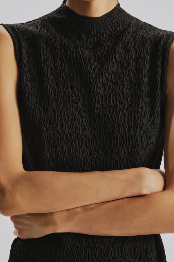 THE ROW Sleeveless Mockneck Top