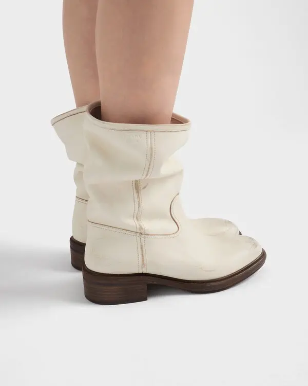 Prada Distressed Mid-calf Boots