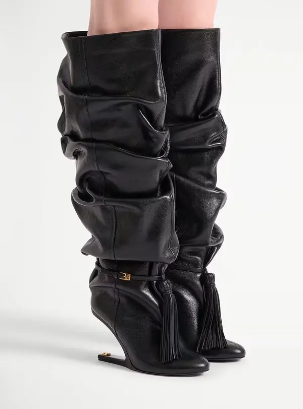 Balmain Textured Leather Thigh-high Boots With Wedge Heel And Tassel Detail