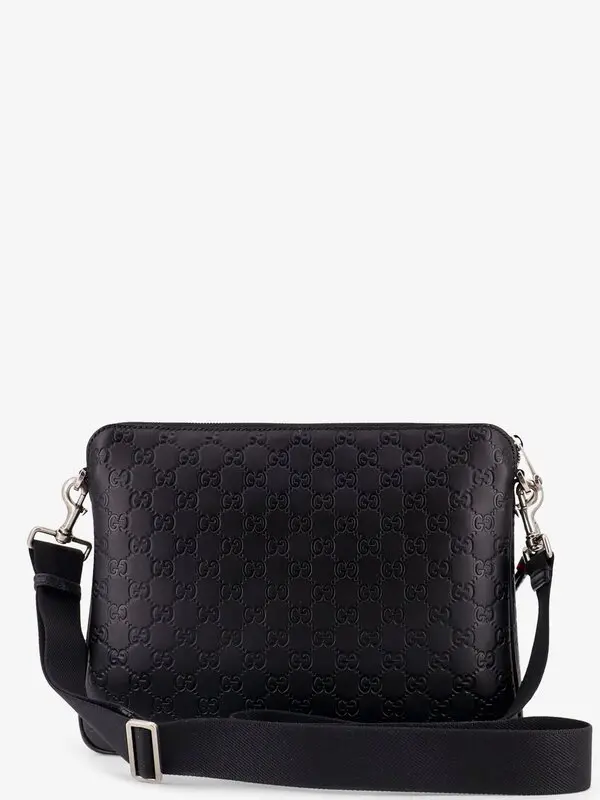 Gucci Leather Gg Emblem Crossbody Bag With Embossed Gg Motif - Black