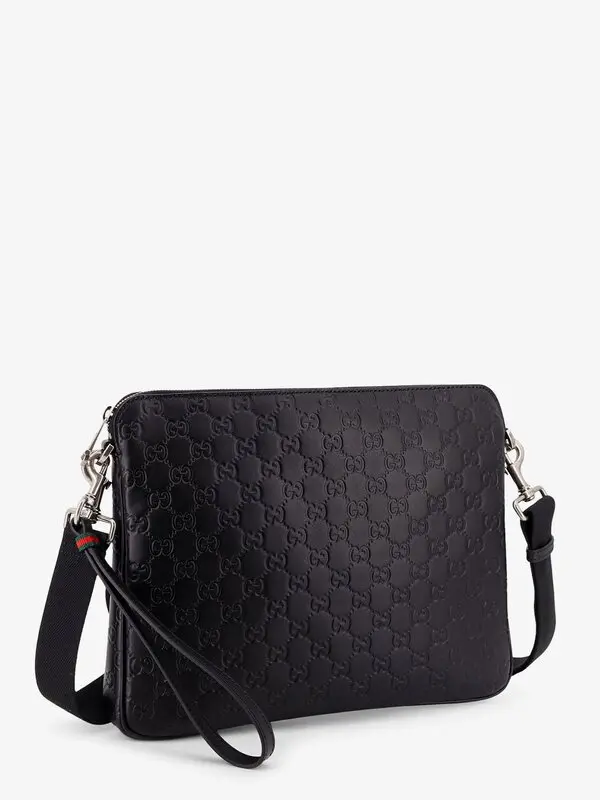 Gucci Leather Gg Emblem Crossbody Bag With Embossed Gg Motif - Black
