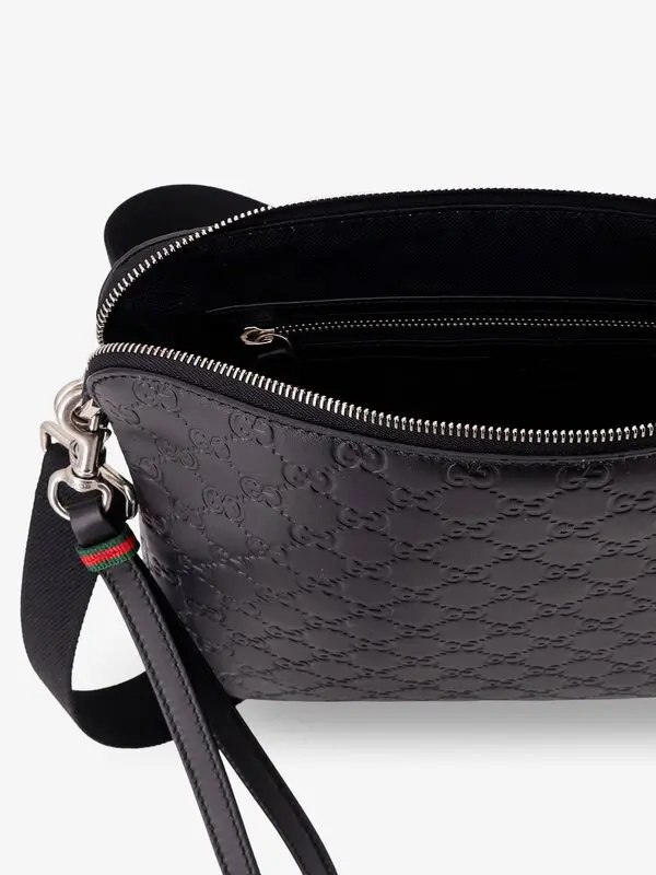 Gucci Leather Gg Emblem Crossbody Bag With Embossed Gg Motif - Black