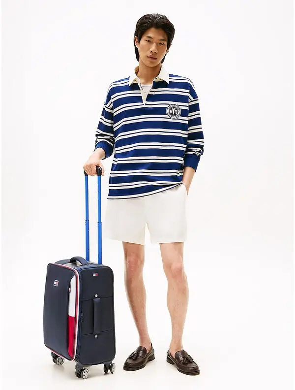 Tommy Hilfiger 21" Upright Spinner Luggage
