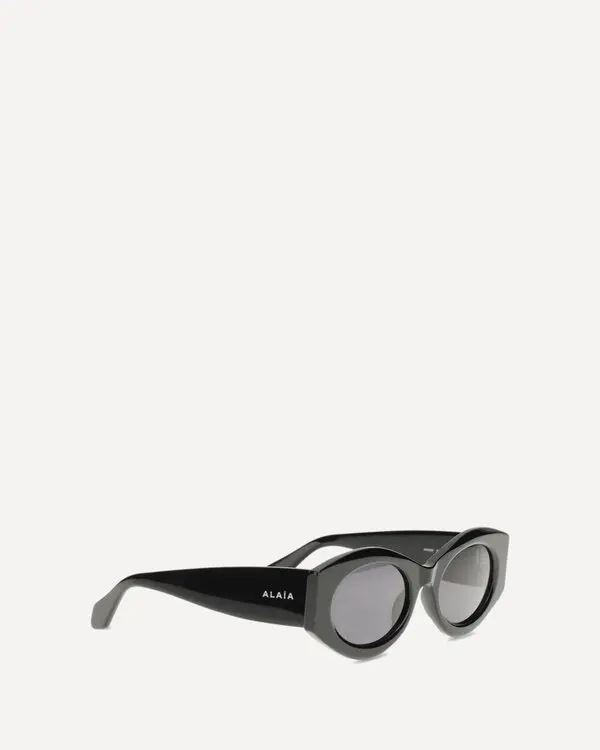 Alaïa Oval Sunglasses - Black