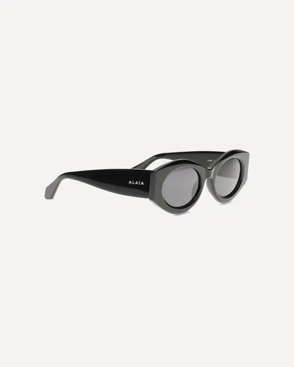 Alaïa Oval Sunglasses - Black