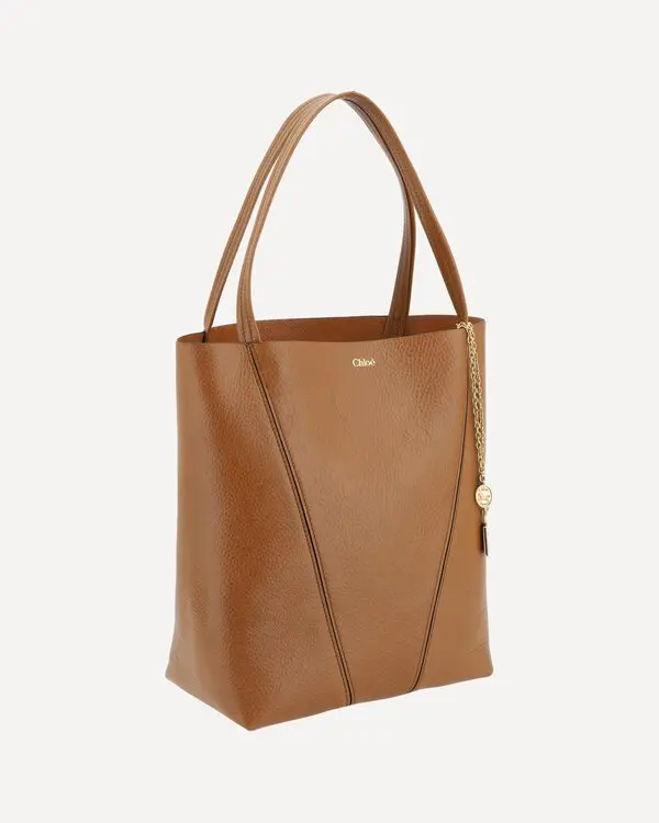 Chloé Grained Leather Spin Shoulder Bag With Monogram Detail