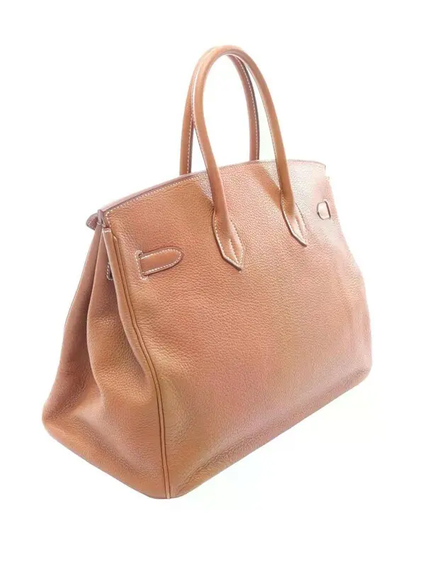 Hermès 35cm Taurillon Clemence Birkin Retourne Handbag In Gold