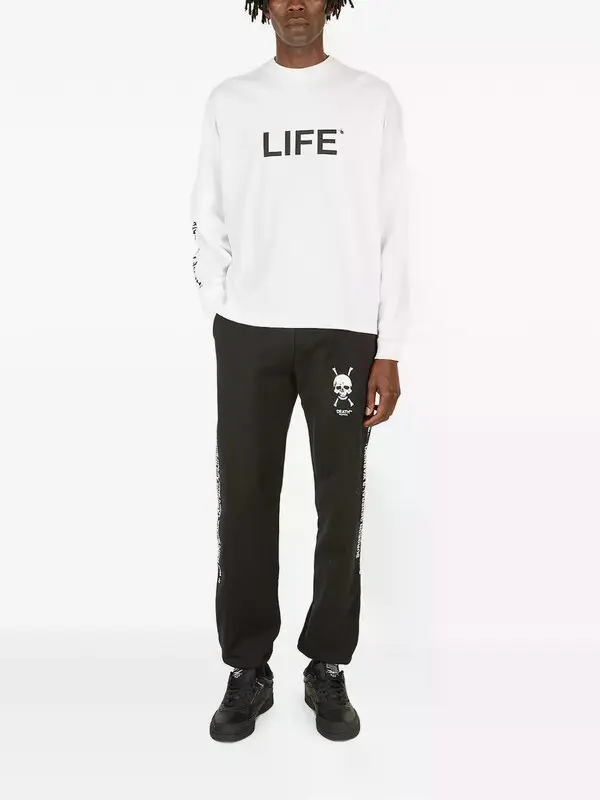 DEATH CIGARETTES Skull Logo Print Trousers