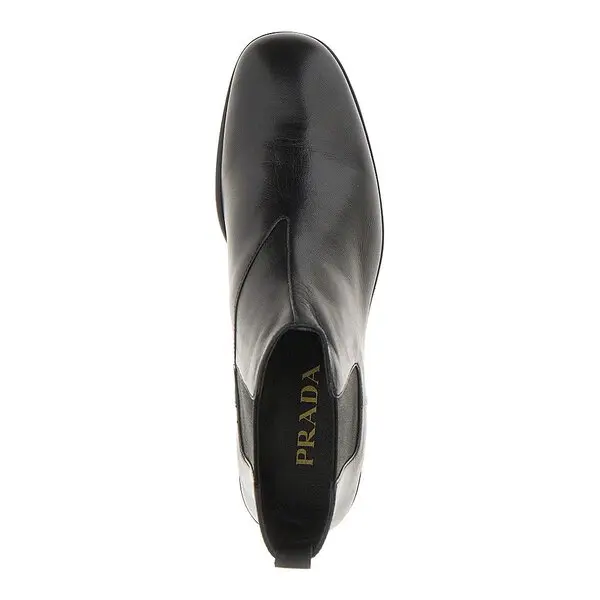 Prada Leather Chelsea Boots With Gold Tone Logo Print