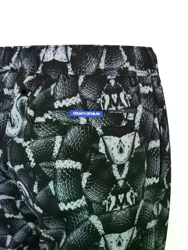 COUNTY OF MILAN Snake-print Shorts