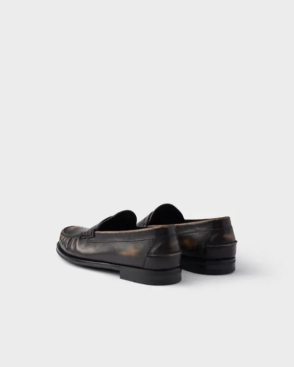 Prada Distressed Penny Loafers