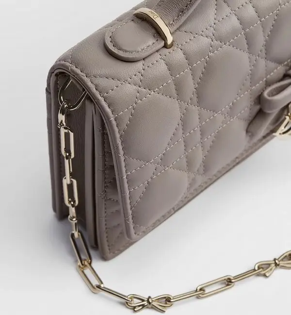 Dior Quilted Flap Crossbody Bag With Bow Detail