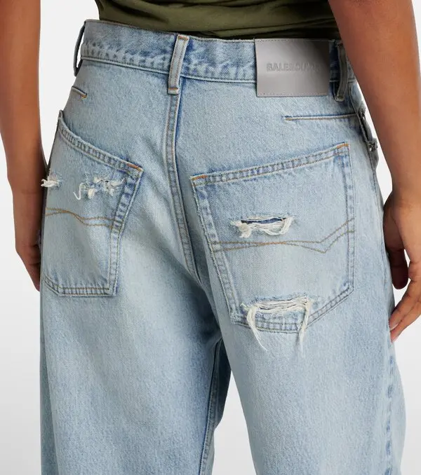 Balenciaga Frayed Tapered Jeans