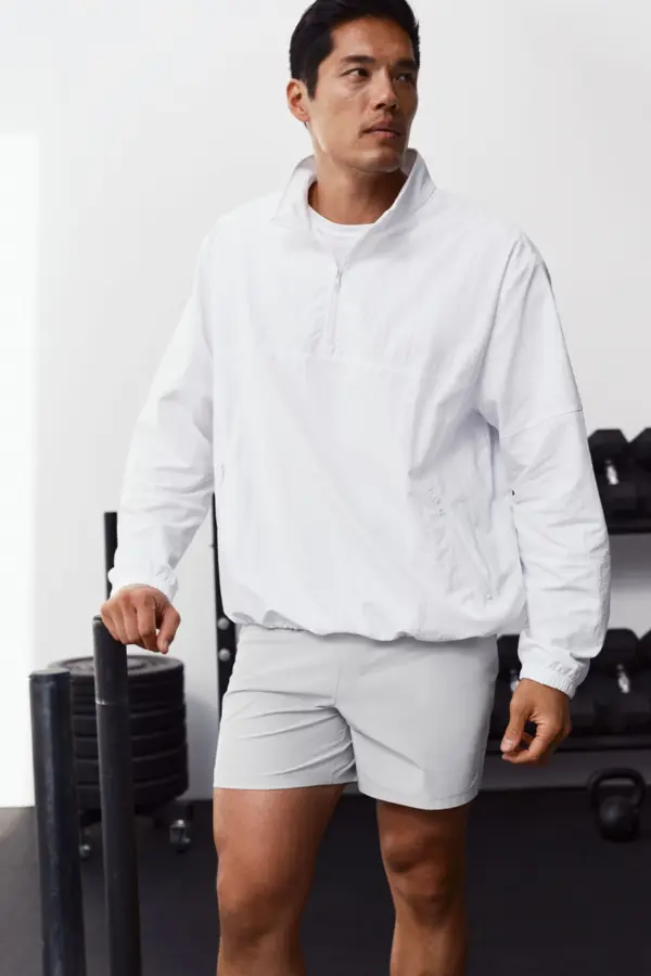 Alo Yoga Light Weight Takeaway Track Pullover Top - White
