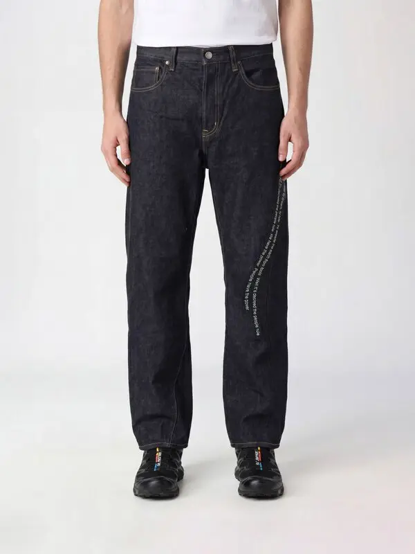 Undercover Straight Fit Stretch Denim Jeans With Slogan Print