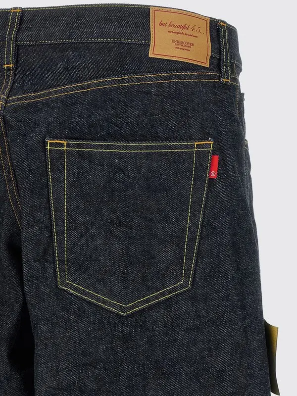 Undercover Straight Fit Stretch Denim Jeans With Slogan Print And Mid-rise Waist
