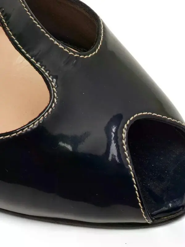 CHRISTIAN LOUBOUTIN T-strap Peep-toe Pumps