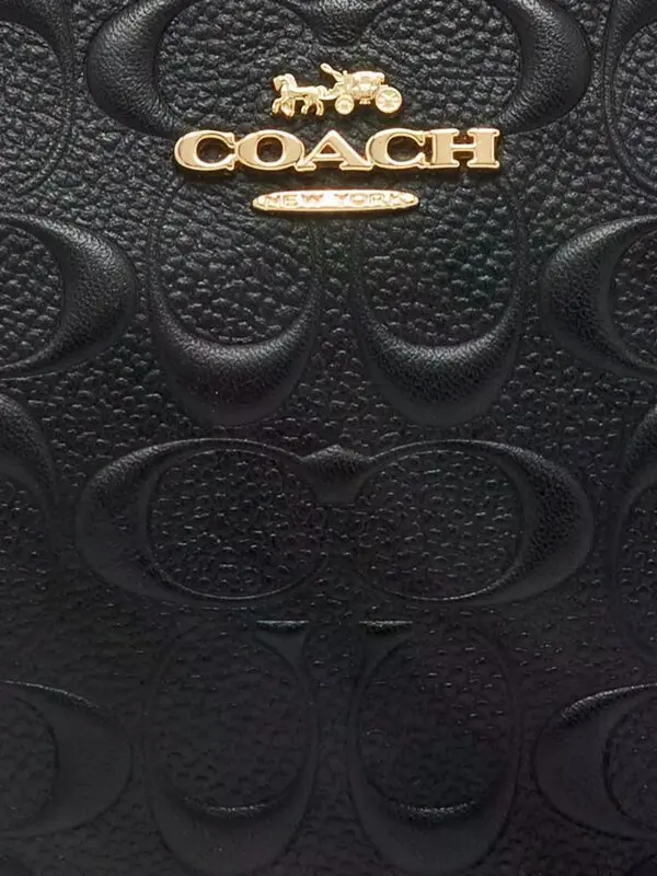 COACH Signature Embossed Mini Bag