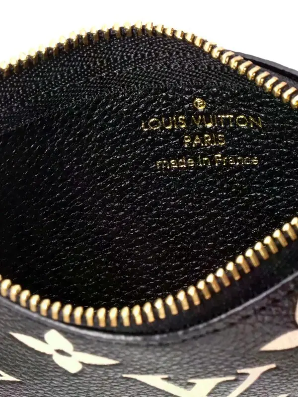 LOUIS VUITTON Bicolor Monogram Empreinte Giant Pouch