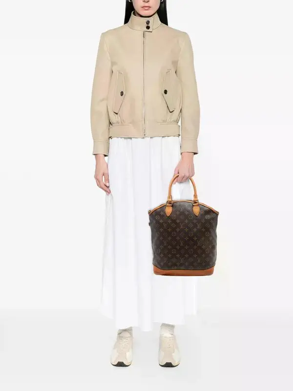LOUIS VUITTON Monogram Lockit Vertical Handbag
