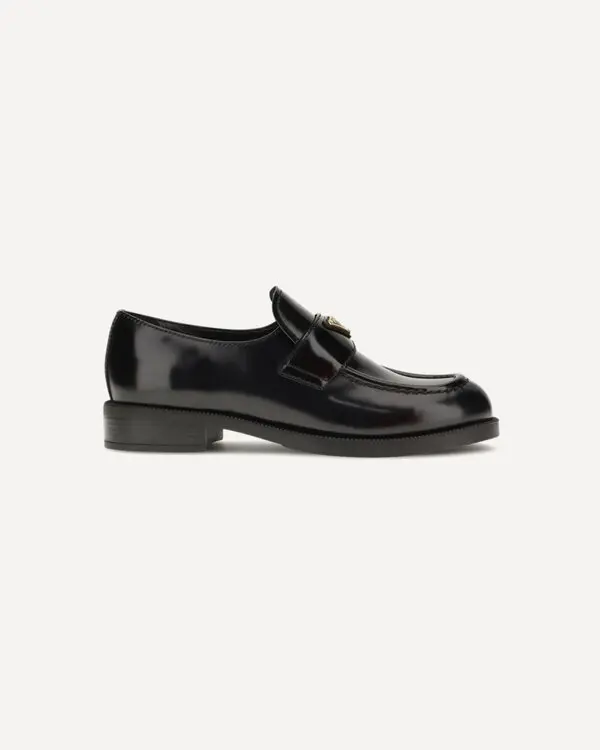 Prada Leather Loafers With Metal Triangle Logo