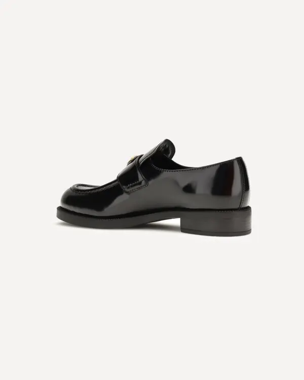 Prada Leather Loafers With Metal Triangle Logo