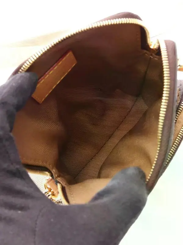 LOUIS VUITTON Monogram Utility Phone Sleeve Satchel