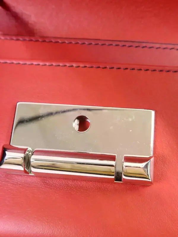 Prada Logo-embossed Leather Clutch Bag