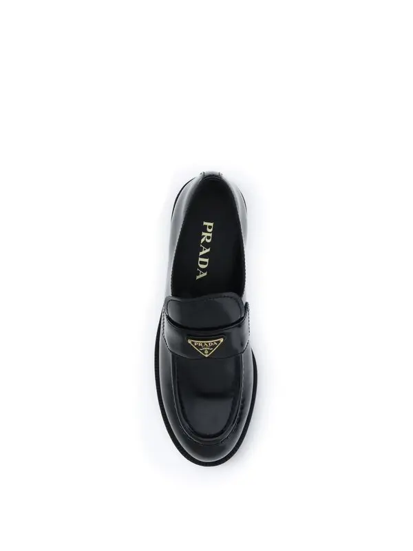 Prada Leather Loafers With Metal Triangle Logo