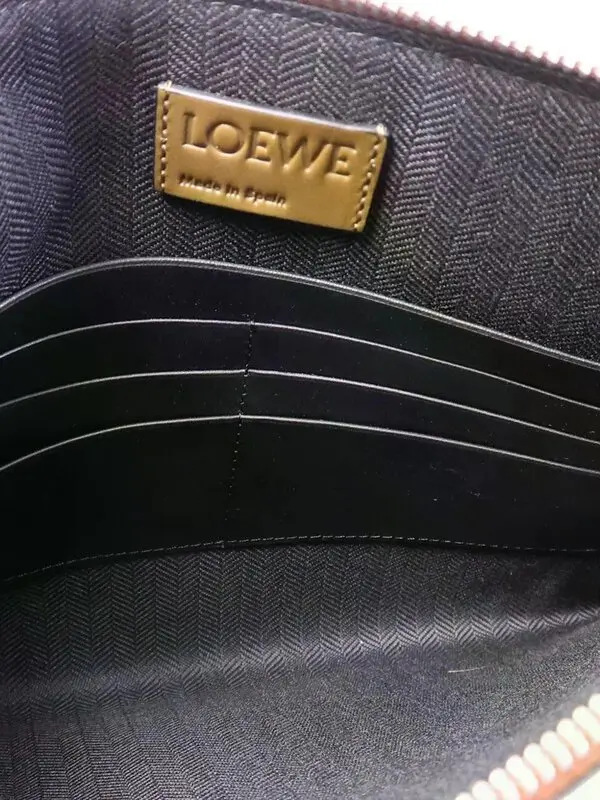 Loewe Anagram Embossed Leather Clutch Bag