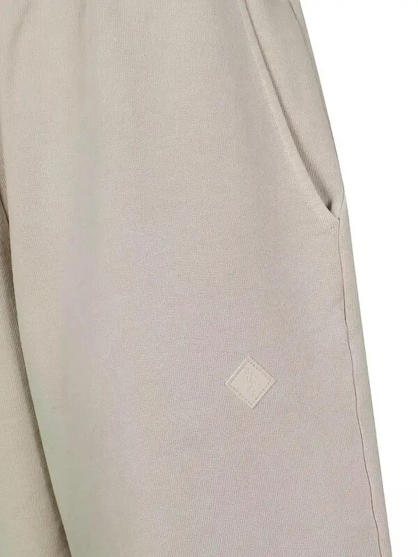 HAIKURE Logo Patch Track Pants