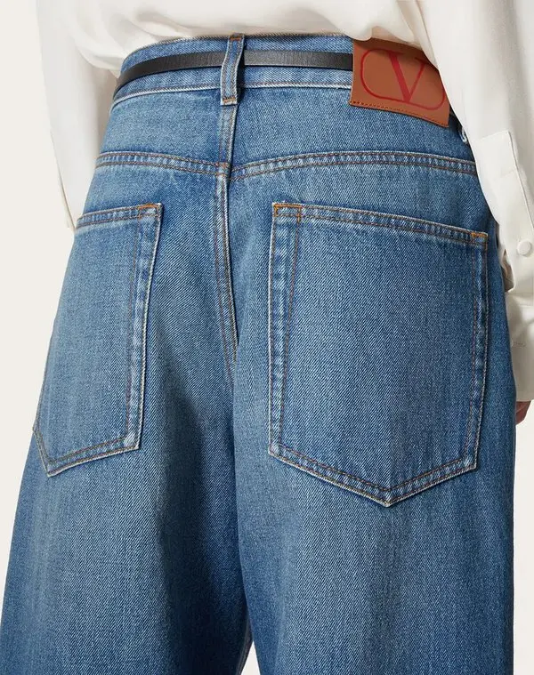 Valentino Garavani Wide Leg Jeans With Logo Patch