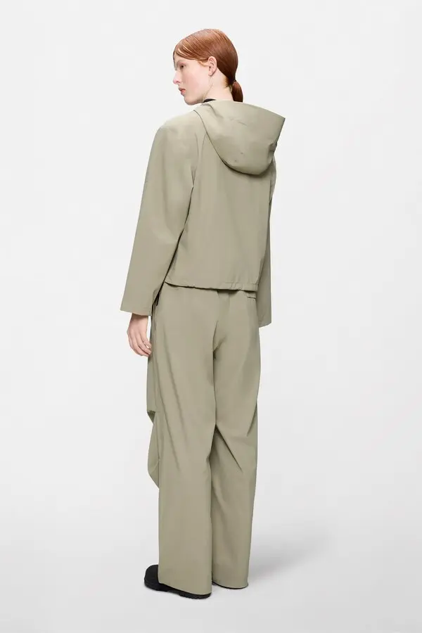 Rains Suva Hardshell Cropped Jacket With Drawstring Hood And Zip Pockets - Beige