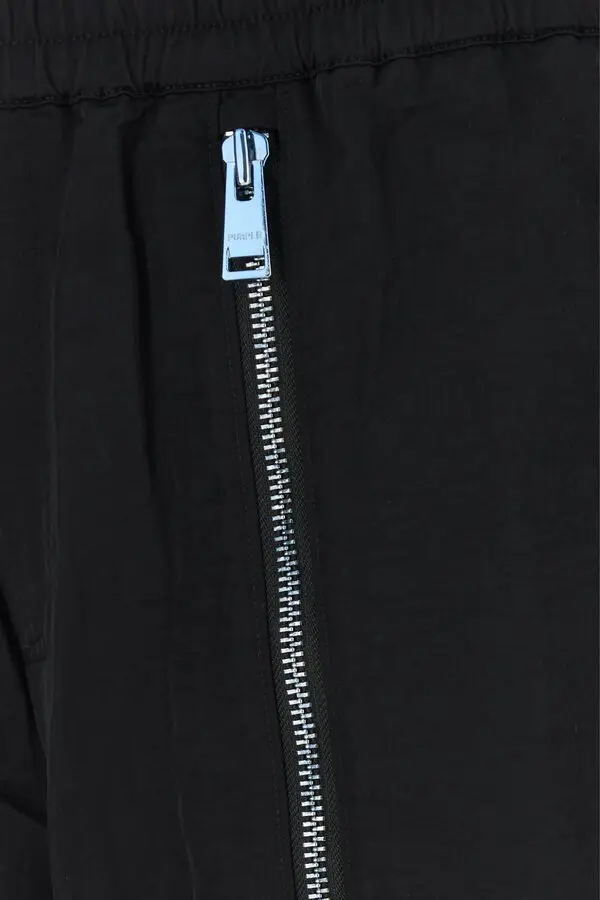 PURPLE BRAND Nylon Pants With Zipped Slits