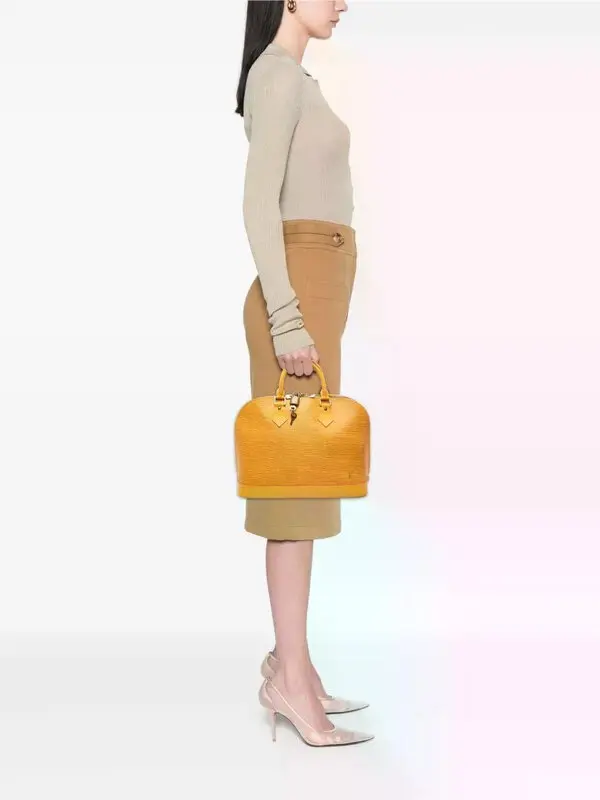 LOUIS VUITTON Epi Alma Pm Handbag - Yellow