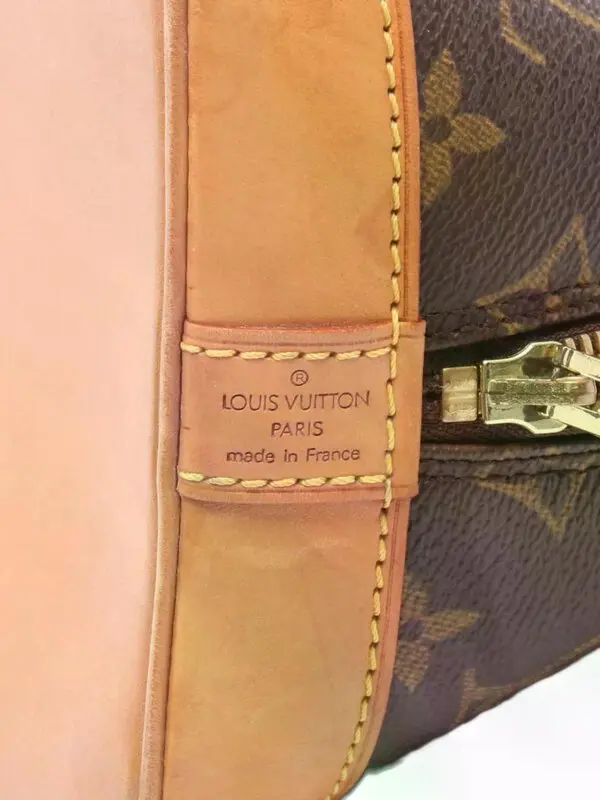 LOUIS VUITTON Monogram Alma Leather Tote Bag
