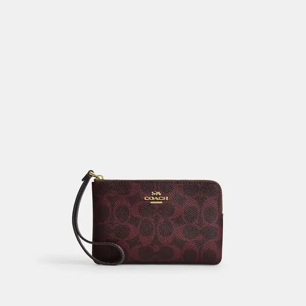 COACH OUTLET Signature Canvas Wristlet - Gold/black Currant
