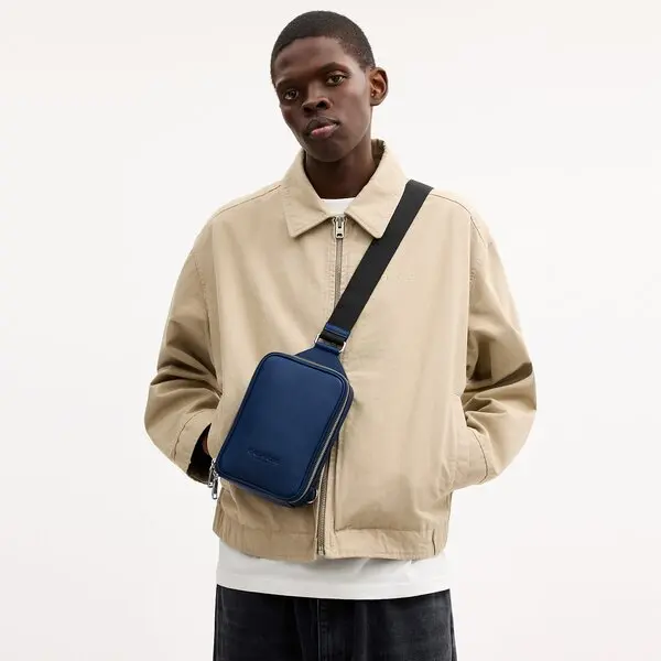 COACH OUTLET Ray Pack Crossgrain Leather Sling Bag With Multifunction Pocket - Silver/deep Blue