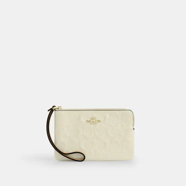 COACH OUTLET Corner Zip Wristlet In Signature Leather With Charm - Gold/light Lemon