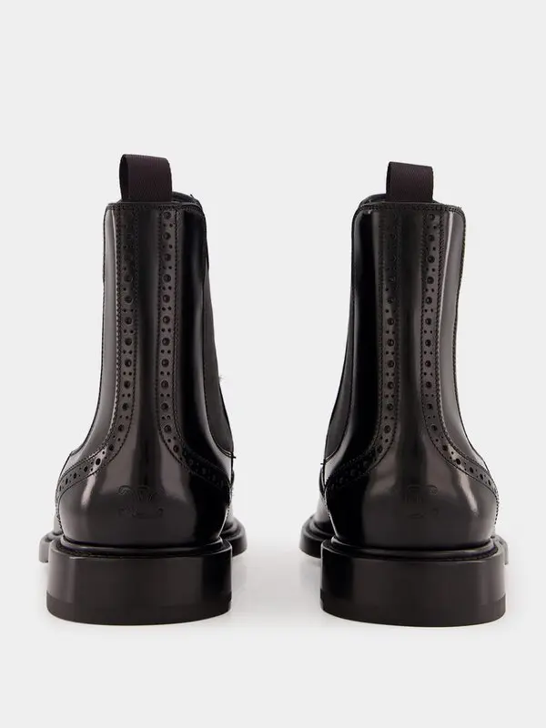 Celine Chelsea Boots With Brogue Detailing In Polished Leather