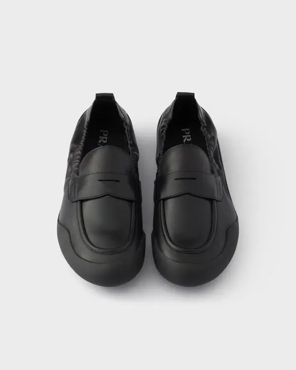Prada Round Toe Loafers With Rubber Sole