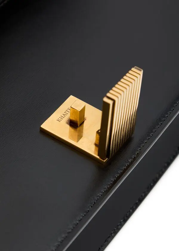 Khaite Blake Leather Clutch With Gold-tone Hardware - Black