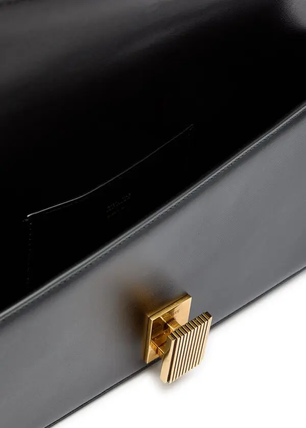 Khaite Blake Leather Clutch With Gold-tone Hardware - Black