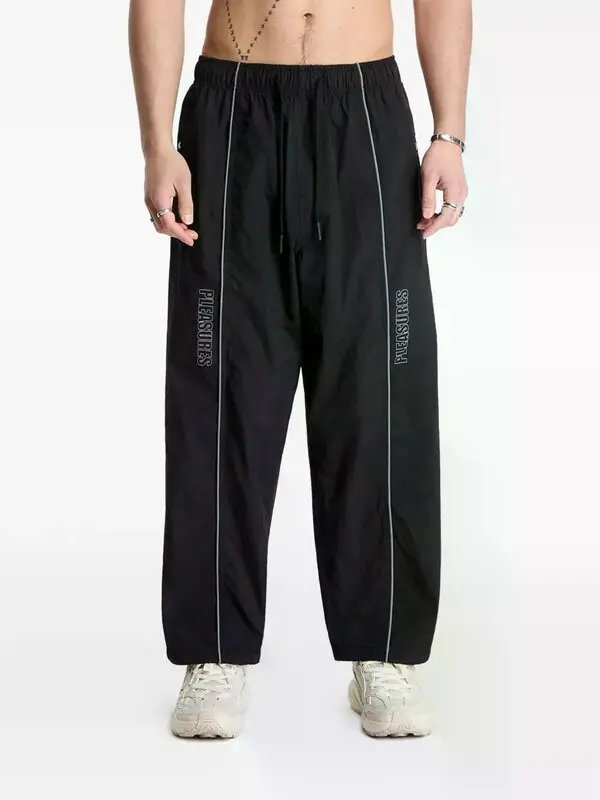 PLEASURES Sound Logo-print Reflective Track Pants - Black