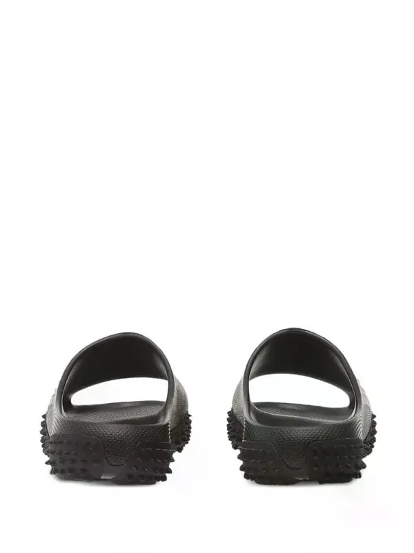 PUMA Mostro Debossed-logo Slides