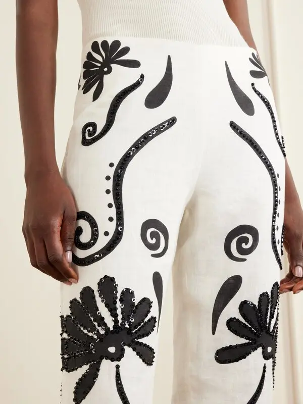 CALA DE LA CRUZ Sylvie Cropped Sequin-embellished Printed Linen Tapered Pants