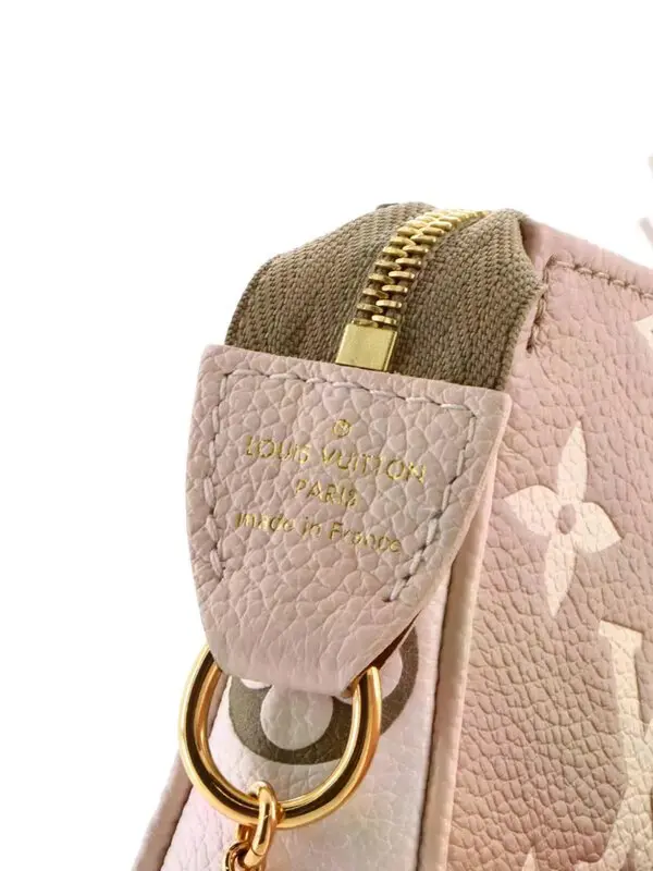 LOUIS VUITTON Pochette Accessoires Monogram Empreinte Leather Mini Clutch Bag - Neutrals