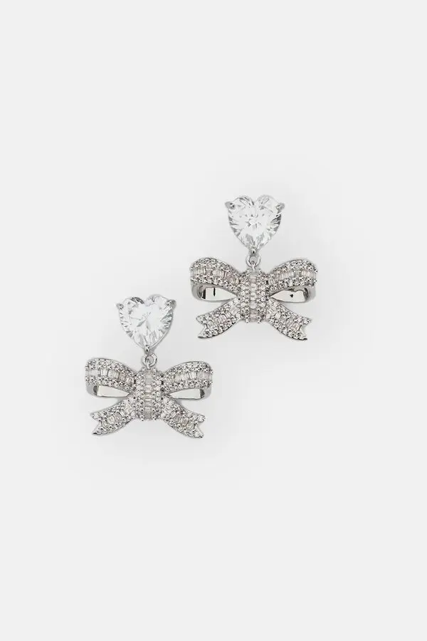 SELF-PORTRAIT Crystal Embellished Heart And Bow Earrings - Argento
